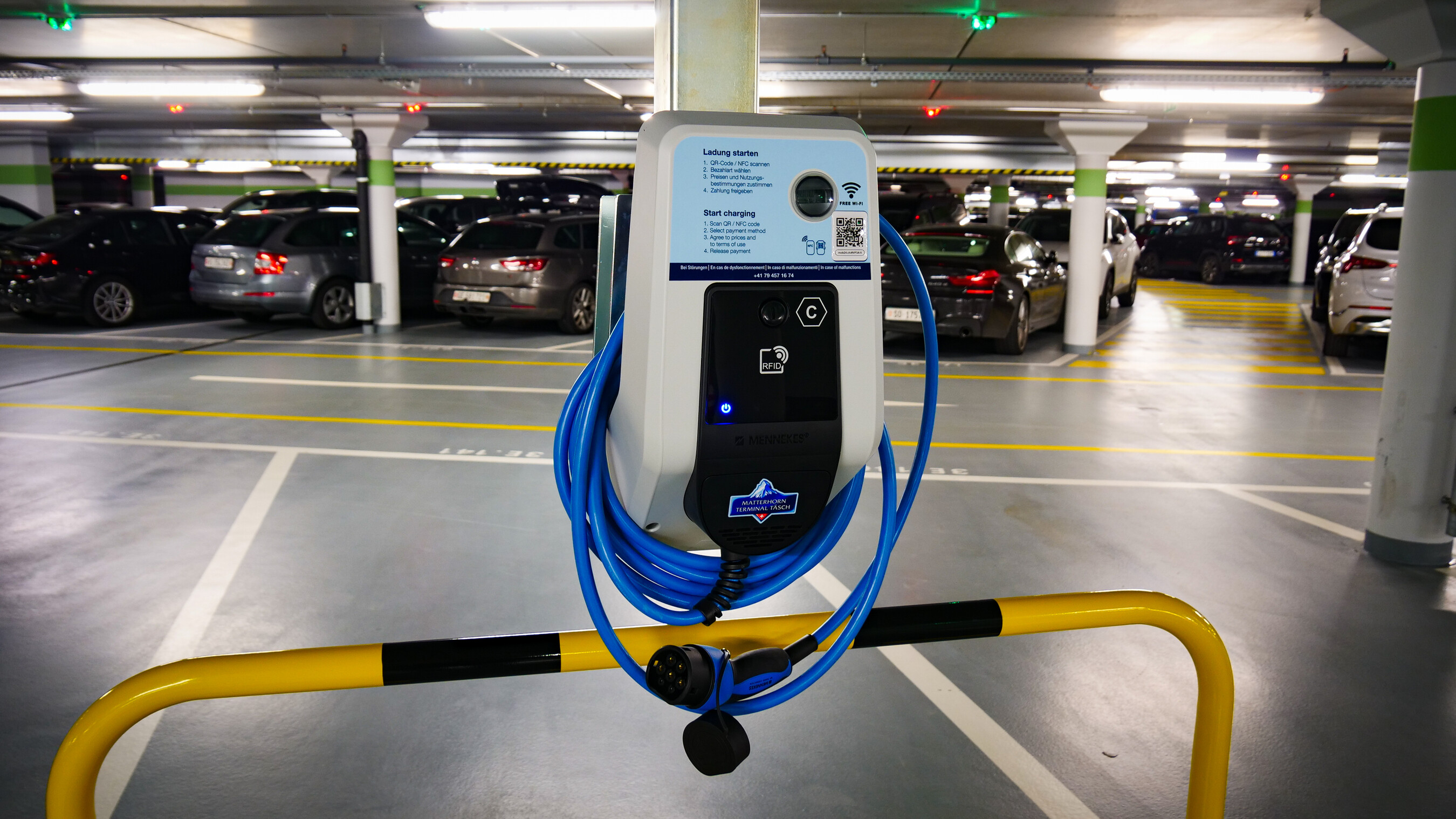 Electric charging station and car park in Täsch.